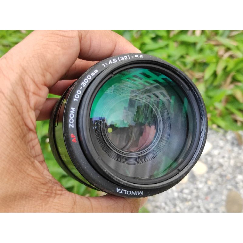 เลนส์Minolta af แดง zoom 100-300mm f4.5(32)-5.6 Dเมาท์ A บอดี้ดำ หน้าเลนส์ขนาด 55 มม | Shopee ...