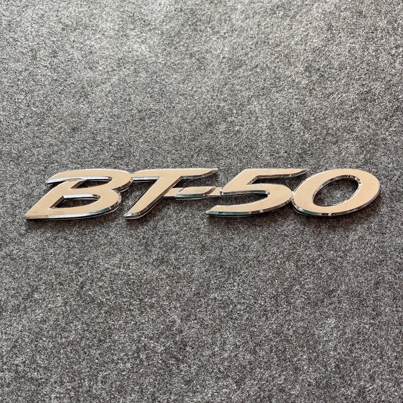 โลโก้ BT-50 ตัวหนังสือฝาท้าย (สีโครเมียม) | Shopee Thailand