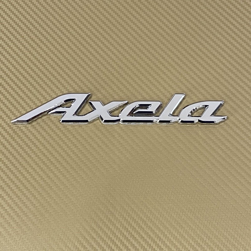 โลโก้* Axela ติดรถ มาสด้า ขนาด* 2.7 x 18 cm สีชุบโครเมี่ยม | Shopee ...