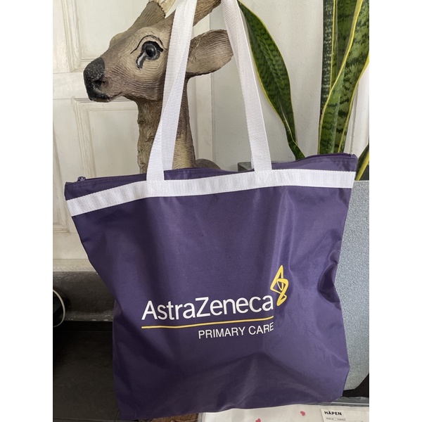 กระเป๋าสะพายผ้าร่ม AstraZeneca แอสตร้าเซนเนก้า สีม่วง | Shopee Thailand