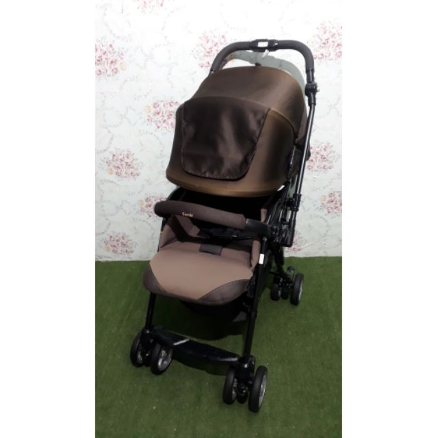 รถเข็น Combi รุ่น miracle Turn Diaclasse A4 cas white label ลายหลุยส์ | Shopee Thailand