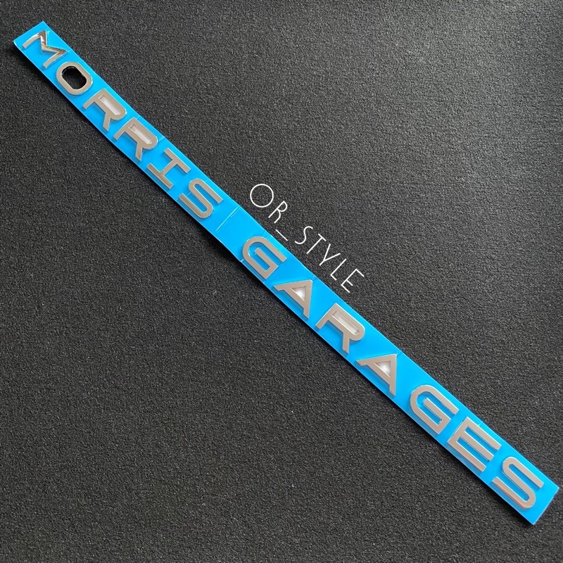 โลโก้ MORRIS GARAGES ตัวนูน ติดฝากระโปรง ขนาด 79x3.5cm | Shopee Thailand