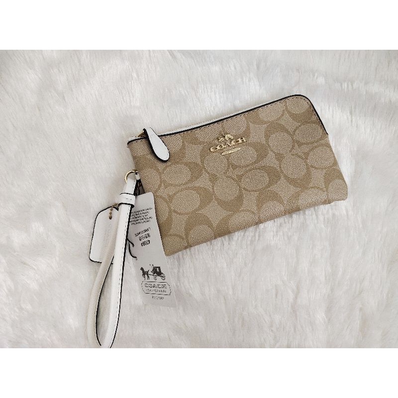 กระเป๋าคล้องมือ Coach 7 นิ้ว | Shopee Thailand