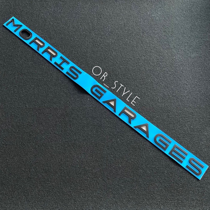 โลโก้ MORRIS GARAGES ตัวนูน ติดฝากระโปรง ขนาด 79x3.5cm | Shopee Thailand