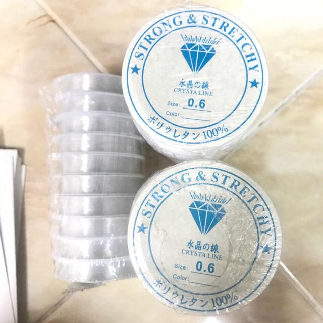 เอ็นยืด ไหมยืด จำนวน 10-25 ม้วน ร้อยลูกปัด มัดไก่ย่าง | Shopee Thailand