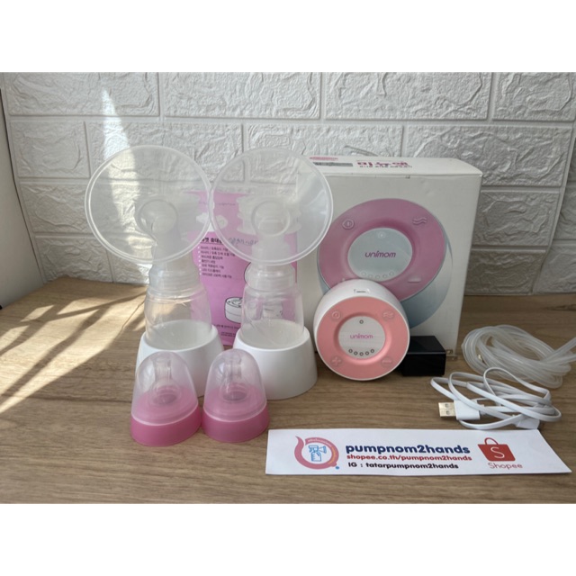 เครื่องปั้มนม Unimom รุ่น Minuet (มีแบตในตัว) | Shopee Thailand