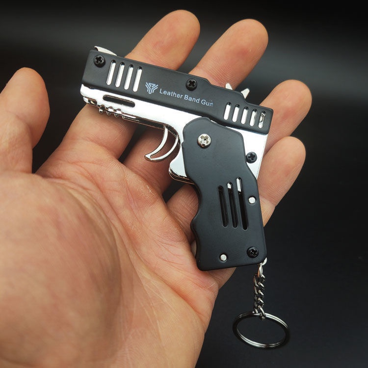 Yingtu โลหะทั้งหมดมินิพับพวงกุญแจยางรัดปืนของขวัญเด็กยางรัด 6 นัดปืนของเล่น | Shopee Thailand