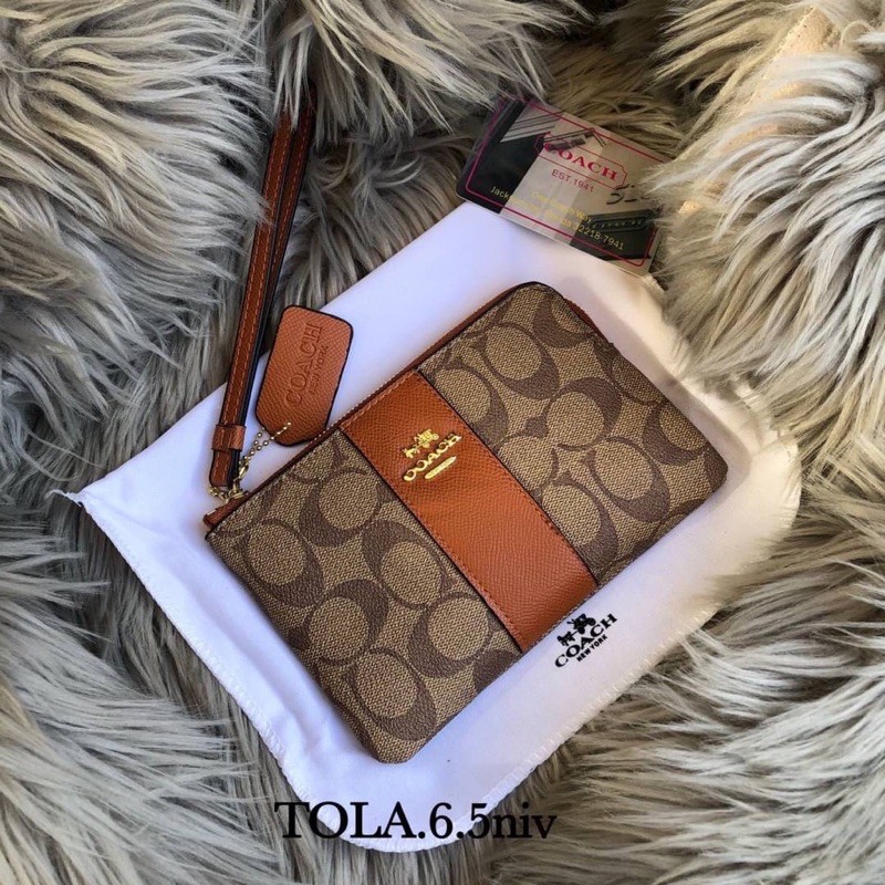 กระเป๋าคล้องมือ New Coach 7” | Shopee Thailand