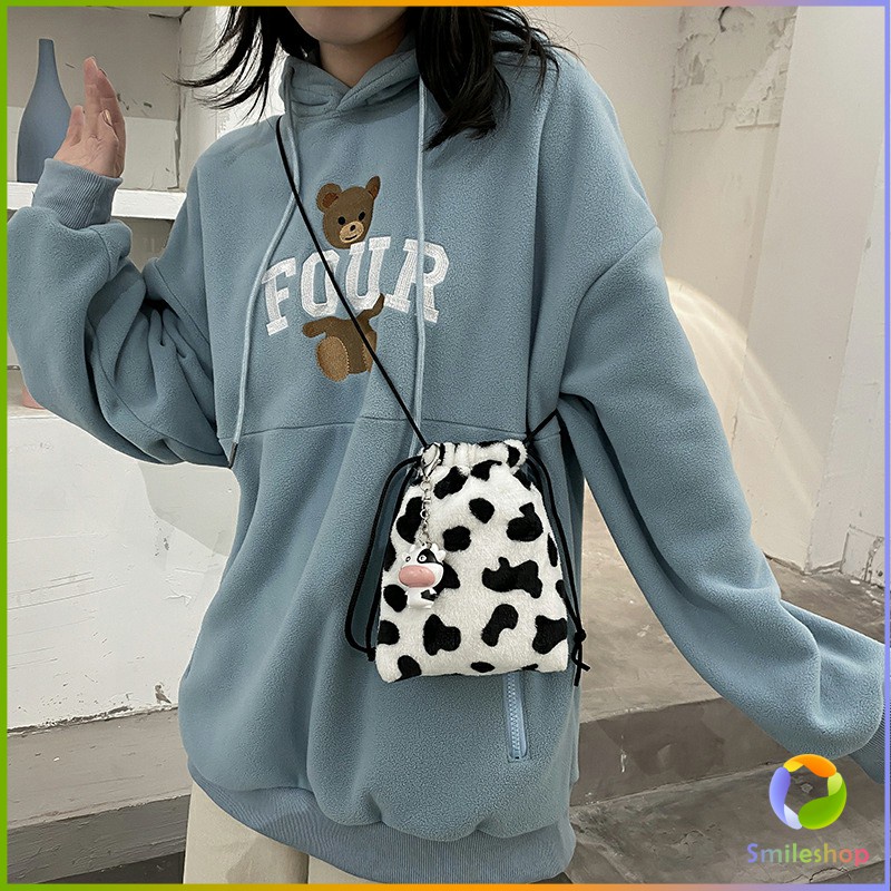 Smileshop กระเป๋าสะพายข้าง กระเป๋าลายวัว ขาว ดำ messenger bag | Shopee Thailand