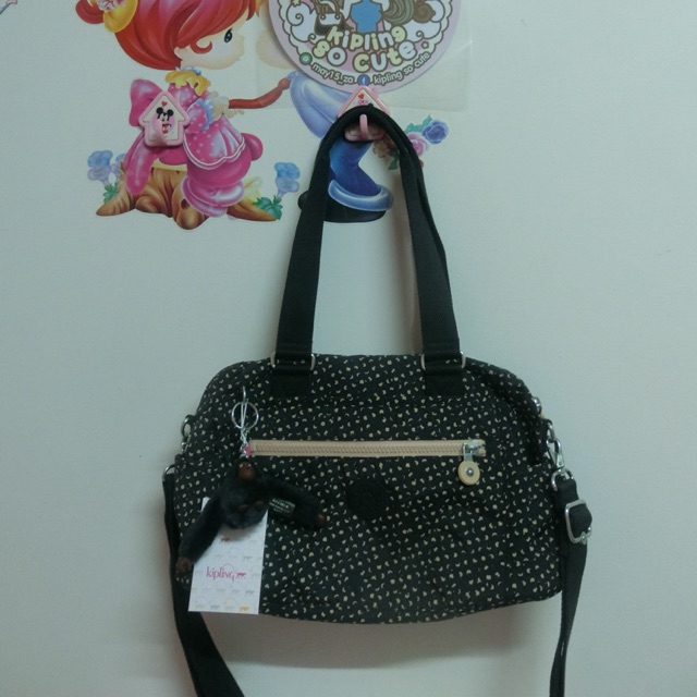 Kipling Cation peach dot | Shopee Thailand