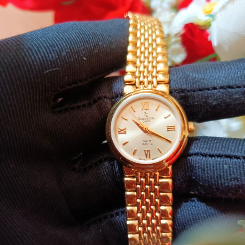 นาฬิกาแบรนด์เนมฝรั่งเศสJacques Edho Paris หน้าปัดสีทอง ตัวแดงสีทองของ ...