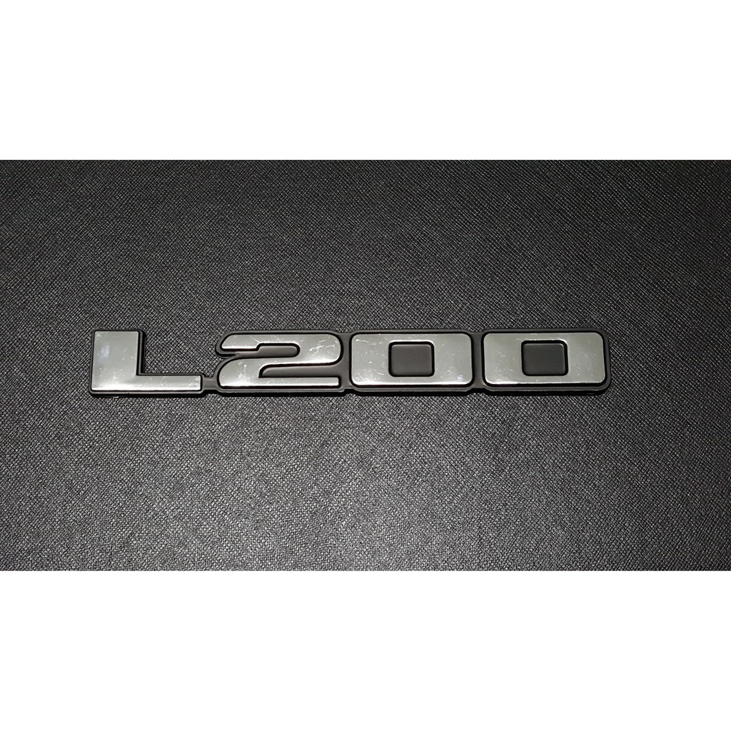 1ชิ้น L200 LOGO แผ่นป้ายติดข้างรถกระบะมิตซูบิชิ ทุกรุ่น สีชุบขอบดำ ...