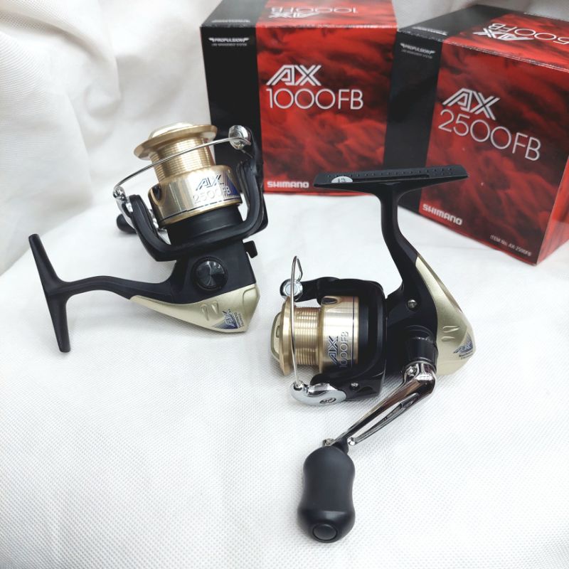 รอกตกปลา SHIMANO # AX 1000 / 2500 FB | Shopee Thailand
