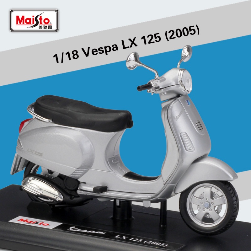 โมเดลรถเวสป้า Maisto ชุด LX125 (2005) สีเงิน Scale 1:18 แฮนด์และล้อหมุนได้ ขาตั้งพับได้ ทำด้วยเ ...