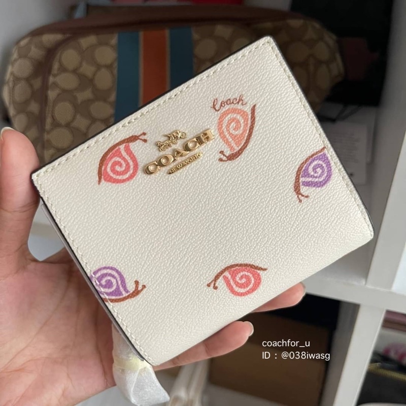 กระเป๋า COACH : Snap Wallet With Snail Print | Shopee Thailand
