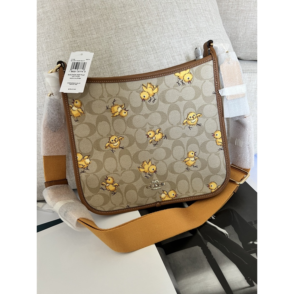 กระเป๋าสะพายข้าง COACH Dempsey File Bag In Signature Canvas With Tossed ...