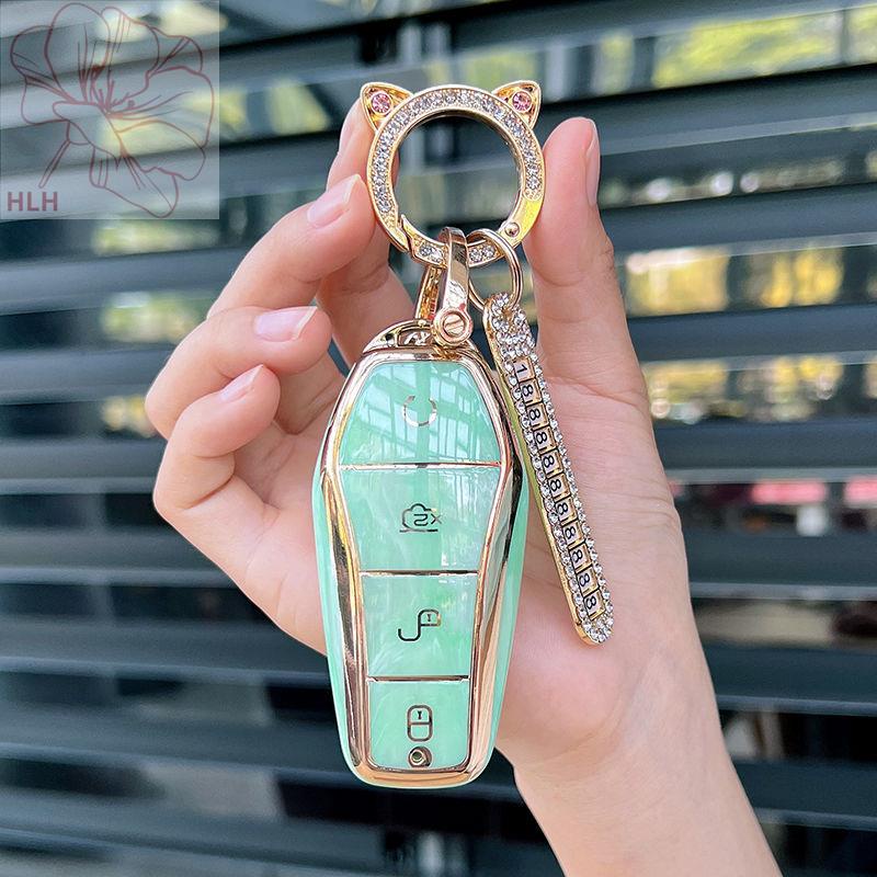 BYD ฝาครอบกุญแจหญิง Qin plusdmi ปลาโลมา EV พิเศษ e2 หัวเข็มขัด e3 กระเป๋า d1 high-end หยวน pro ...