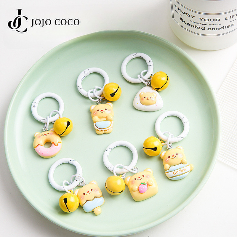 Jojo COCO การ์ตูนเนยหมีจี้พวงกุญแจเสื้อผ้าอุปกรณ์เสริม | Shopee Thailand