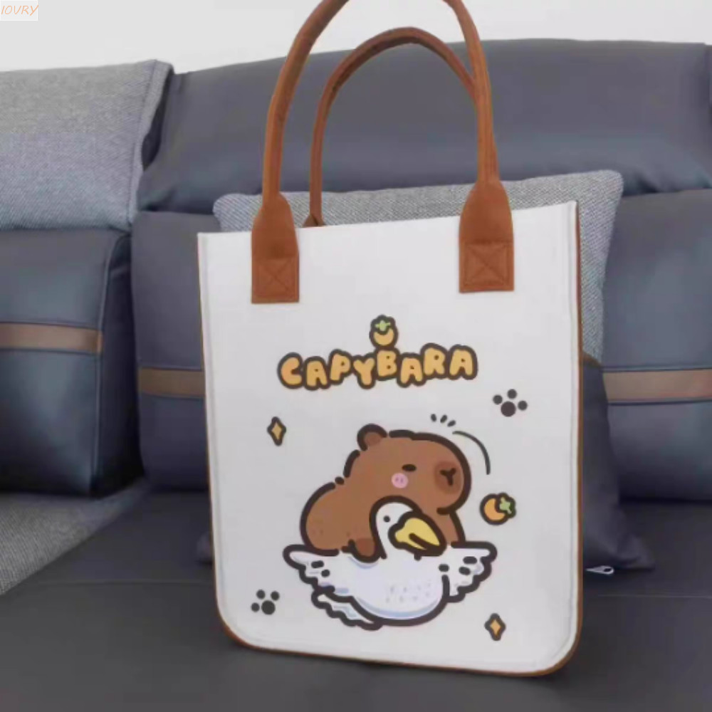 Ivory Labubu Felt กระเป๋าถือ, Lotus Flower Loopy Capybara กระเป๋าสะพาย ...