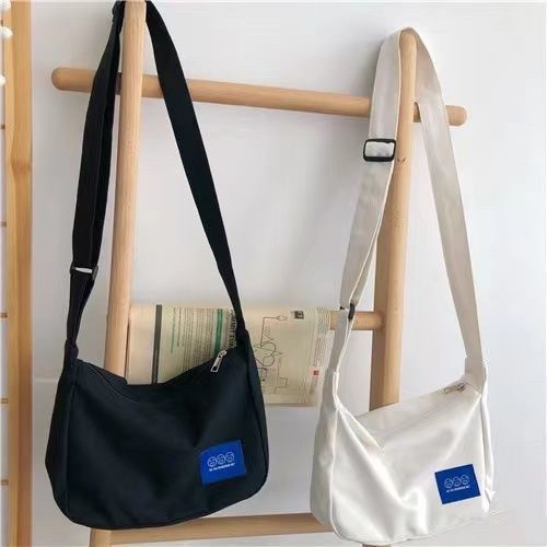 Lenira (B1913) กระเป๋าผ้าแคนวาสใบเล็ก-ป้ายงานสกีน | Shopee Thailand