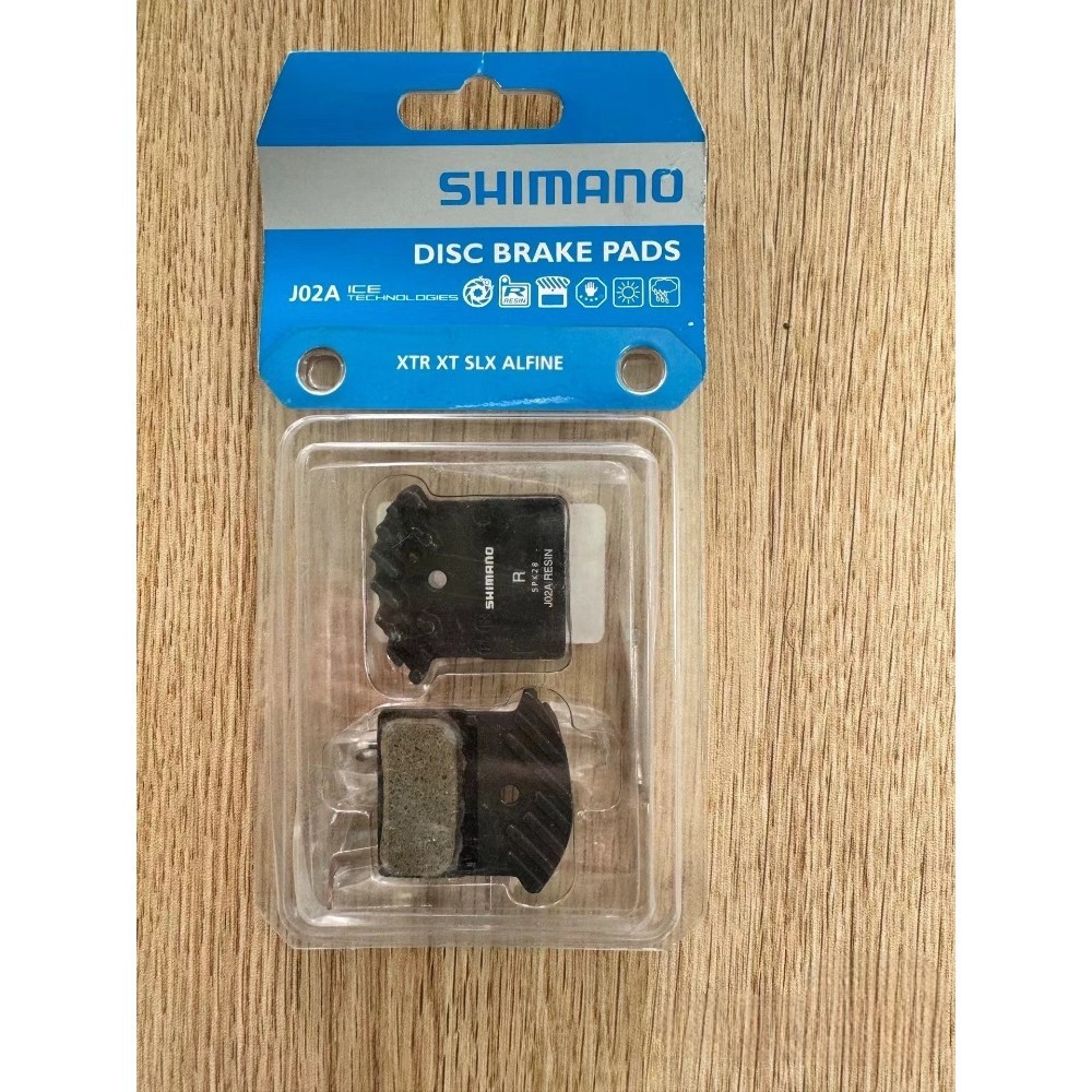 SHIMANO J02A ผ้าเบรคสําหรับจักรยาน MTB Ice Technologies 2 ลูกสูบโลหะเรซิ่นสําหรับ Deore SLX XT ...
