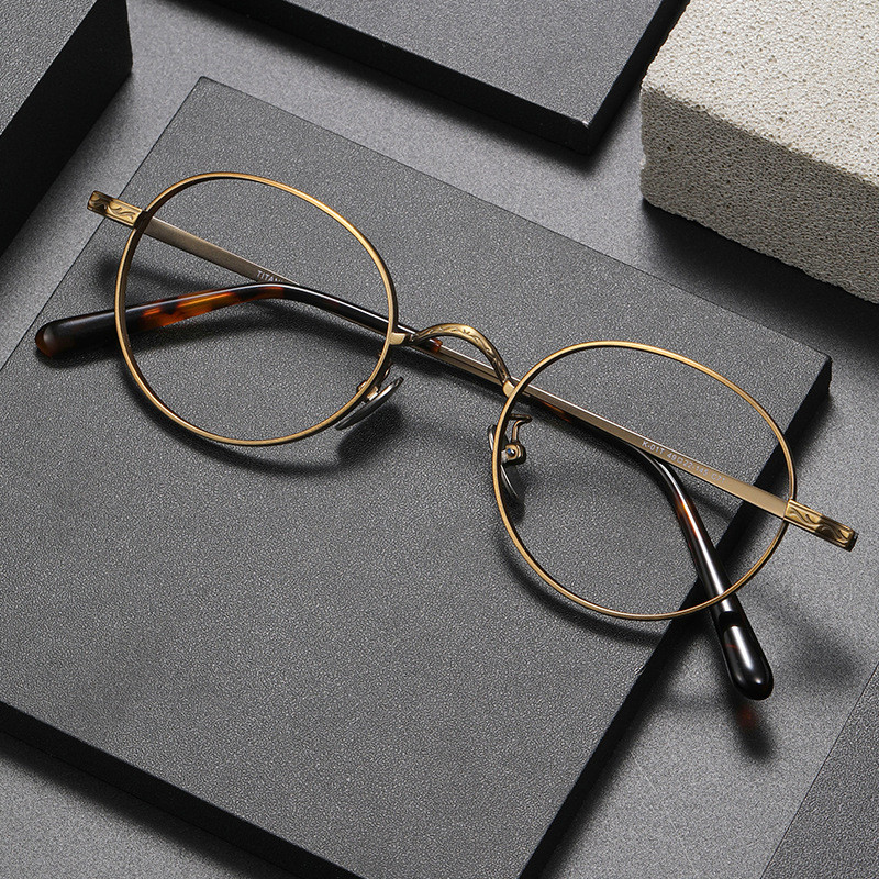 กรอบแว่นตารูปไข่สไตล์ใหม่ของญี่ปุ่น Ultra-Light Semi-Titanium Retro ...