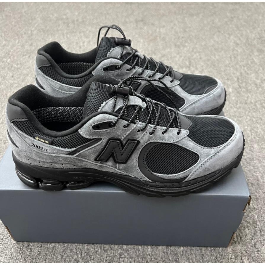 New Balance 2002 NB2002 รองเท้าวิ่งแบบหุ้มข้อสีเทาคาร์บอนสำหรับทั้งชาย ...