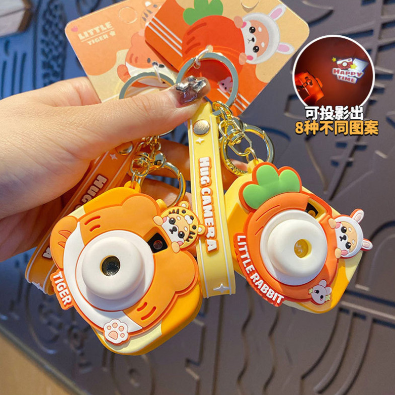 ของแท้ Xiaocai Chai พวงกุญแจกล้องโปรเจคเตอร์ กระเป๋านักเรียนน่ารัก ของขวัญน่ารัก สนุก | Shopee ...