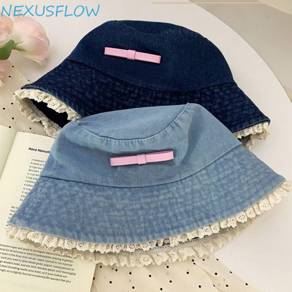 NEXUSFLOW หมวกบัคเก็ตเดนิม ขอบกว้างสไตล์เรียบหรูกับดีไซน์โบว์ ป้องกันยูวีสำหรับสวมใส่ในวันสบายๆ ...