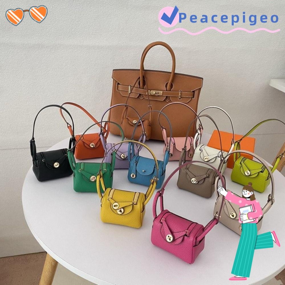 PEACEPIGEO กระเป๋าทรงถังขนาดเล็ก ดีไซน์แฟชั่น กับสายสะพายแบบคาวай และชุดหูฟังป้องกันฝุ่น ...