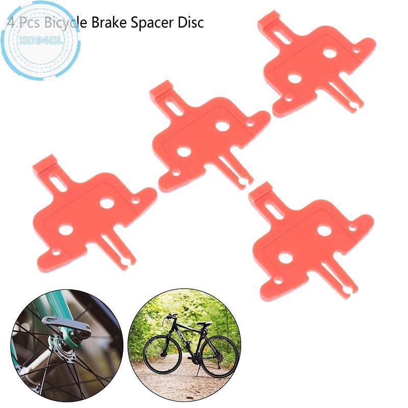 ชิ้นส่วนจักรยานเสือภูเขา: Set 4 ชิ้น Spacer Disc และ Pads สำหรับเบรคไฮด ...