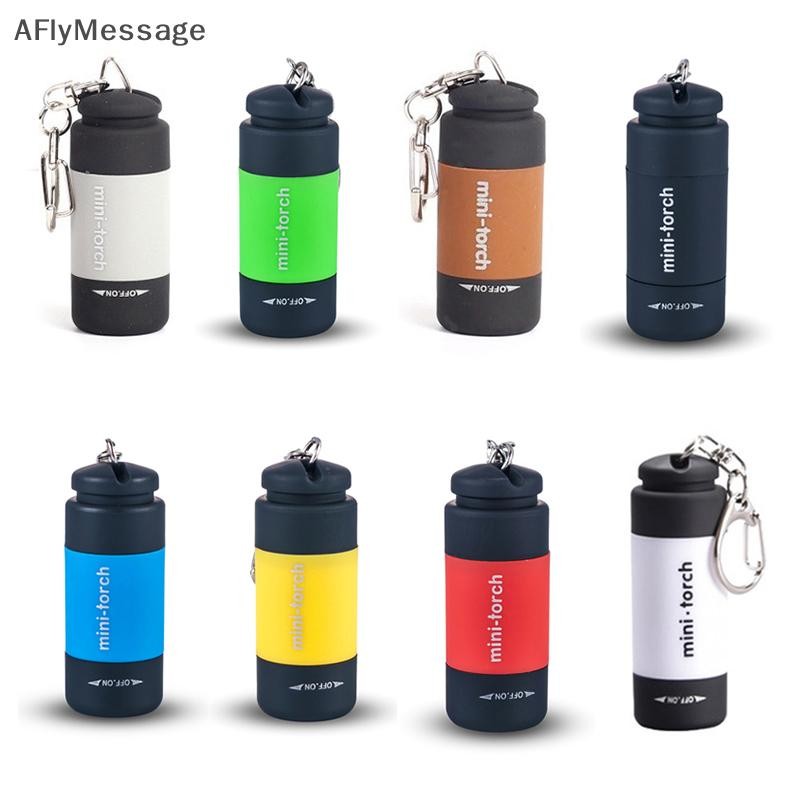 AFl LED ไฟฉายขนาดเล็กแบบพกพา USB ชาร์จพวงกุญแจไฟฉายกันน้ํากลางแจ้ง TH ...