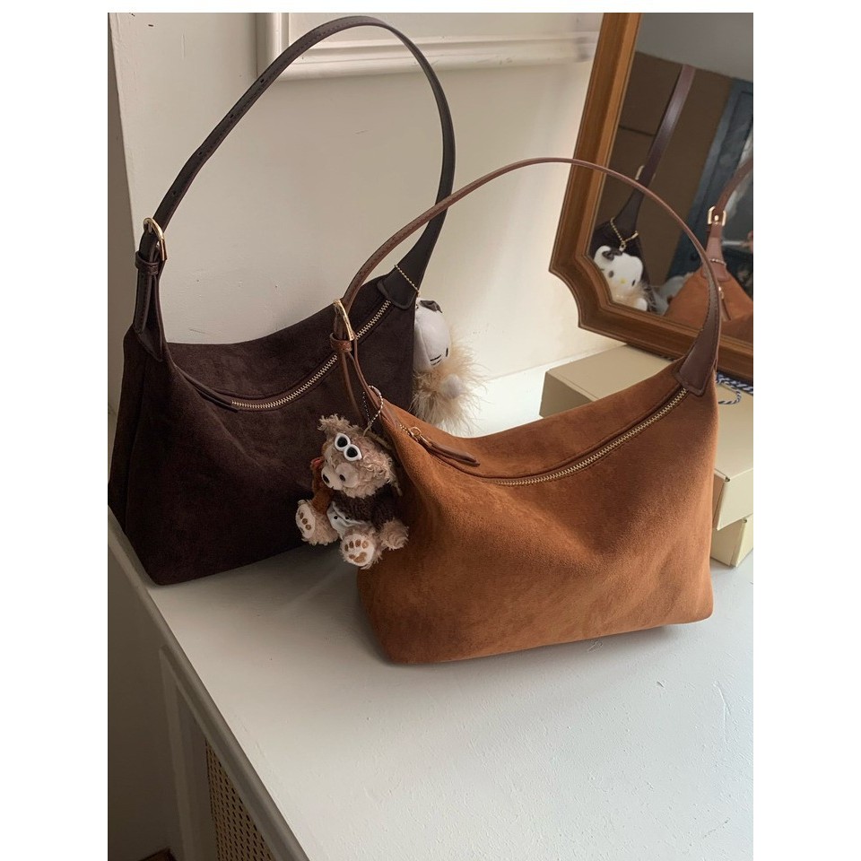 ฤดูใบไม้ร่วงและฤดูหนาวเวอร์ชั่นเกาหลี Retro Suede Simple dumpling BAG | Shopee Thailand