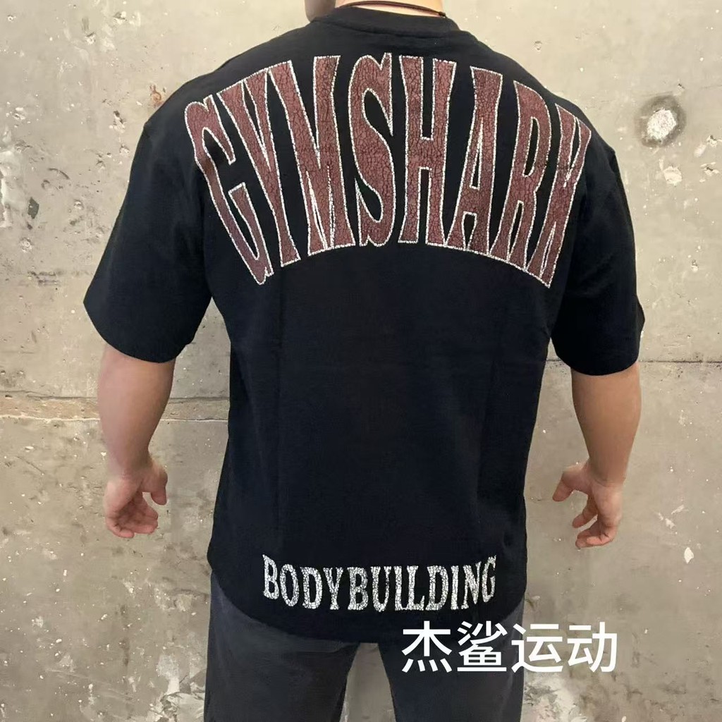 Gymshark Bodybuilding Graphic เสื้อยืดแขนสั้นผู้ชายอินเทรนด์อินเทรนด์ ...