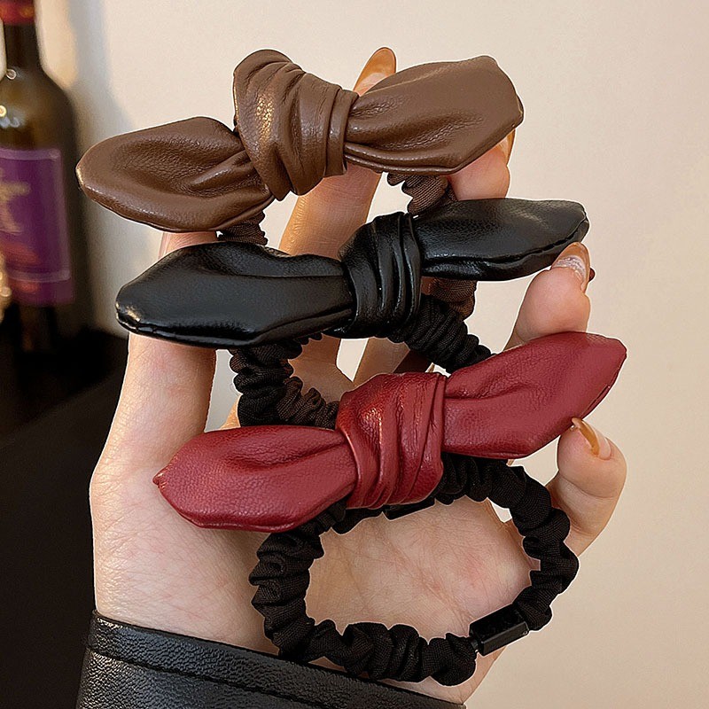 หนัง Bowknot จีบผม Tie ผู้หญิง 2025 สไตล์ใหม่ผมหางม้าสูงผม Tie | Shopee ...