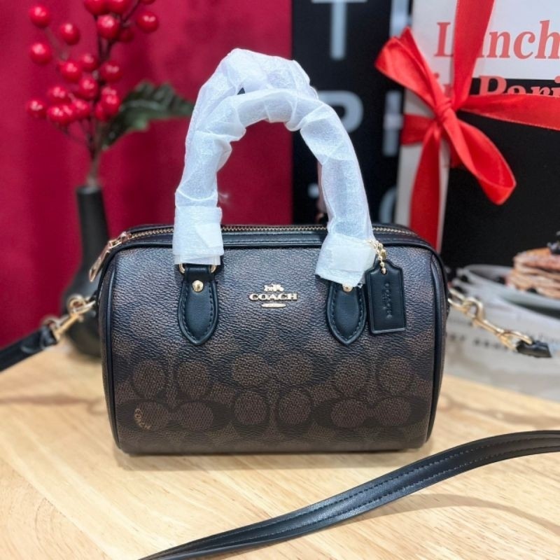 หมอนมินิหนังคอลใหม่ COACH Mini Rowan Crossbody Bag In Signature Canvas CW329 | Shopee Thailand