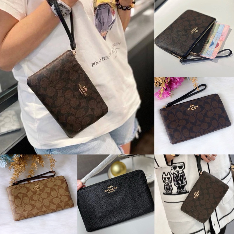 ♞COACH Large Corner Zip Wristlet In Signature Canvas Style No. 6648 ใส่ ...