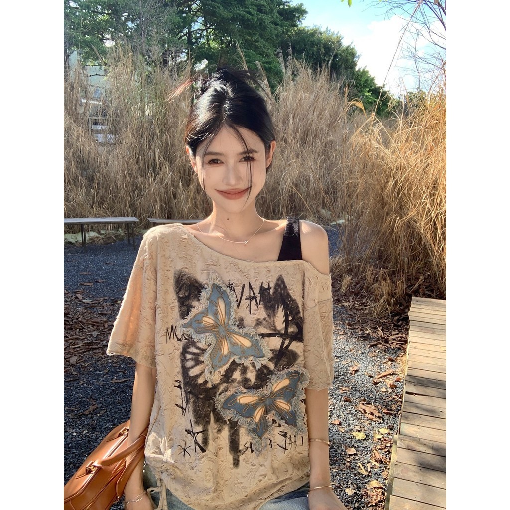 77247 เสื้อยืดแขนสั้นเปิดไหล่พิมพ์ลายผีเสื้อด้านบน | Shopee Thailand