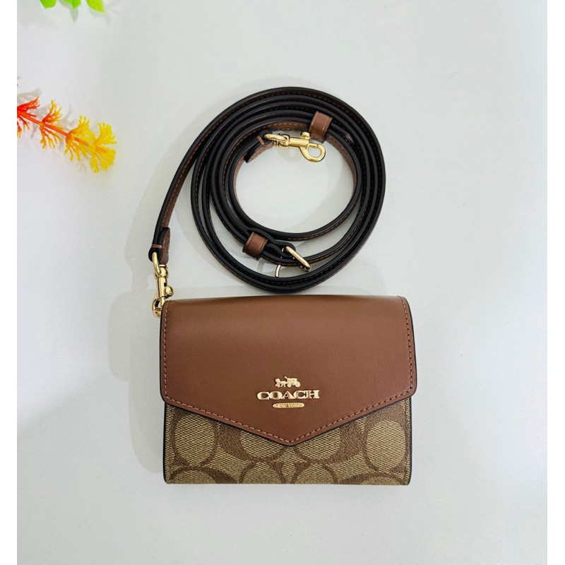 ♞พร้อมส่ง Coach Mini Envelope Wallet With Strap In Signature Canvas สี ...