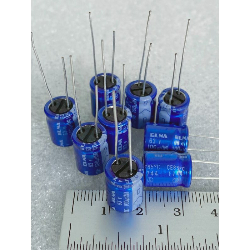 (แพ็ค10ตัว)CAPACIOR 100UF 63V ELNAแท้-ใหม่ BP ไม่มีขั่วบวกขั่วลบขนาด10x12mm85Cสีฟ้า C100uf63v ...