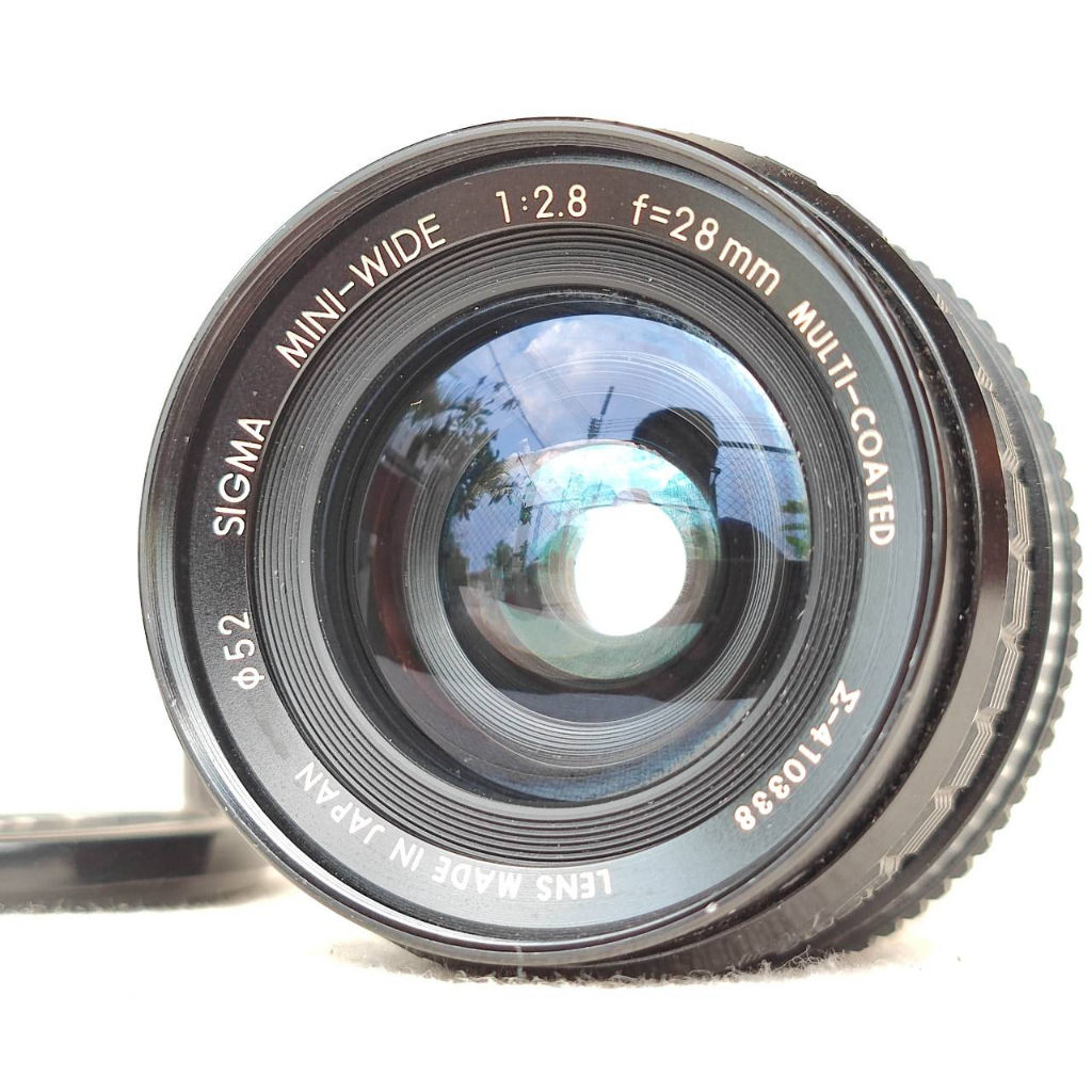เลนส์มือหมุน ยี่ห้อ Sigma mini wide multicoated 28mm f/2.8 MF Mount Ai ...
