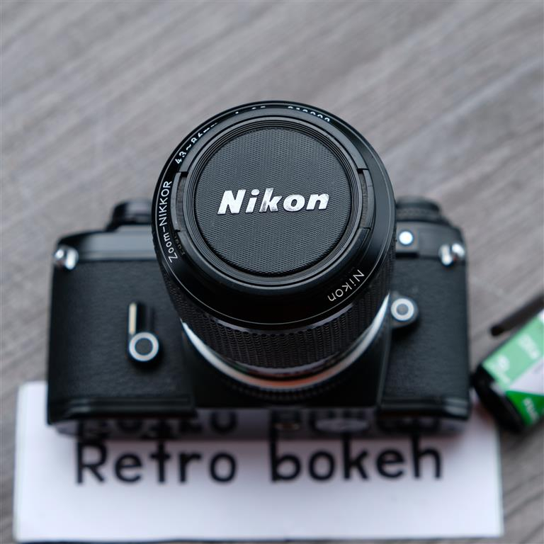 กล้องฟิล์ม Nikon EM + เลนส์ NIKON Zoom 43-86 mm f3.5 คงที่ถ่ายละลายหลังได้ สภาพดี ใช้ง่าย ได้ครบ ...