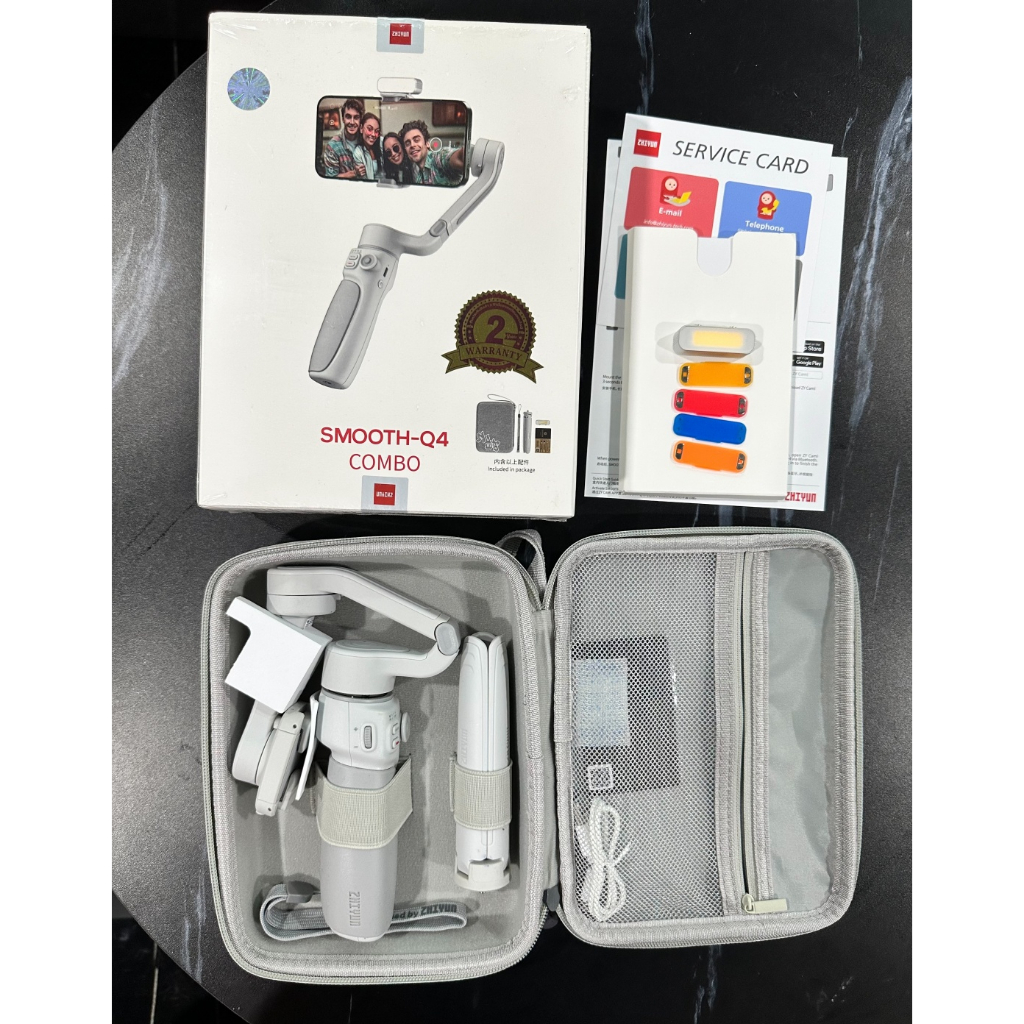รุ่น Combo มือ 2 สภาพ 99% ไม้กันสั่น Zhiyun Smooth Q4 Smartphone Gimbal Stabilizer กันสั่นยืดได้ ...
