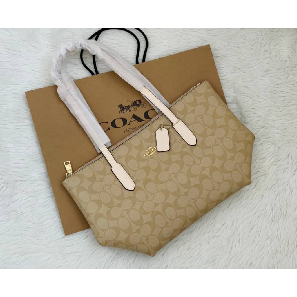 Coach ZIP TOP TOTE IN SIGNATURE CANVAS (4455) | Shopee Thailand