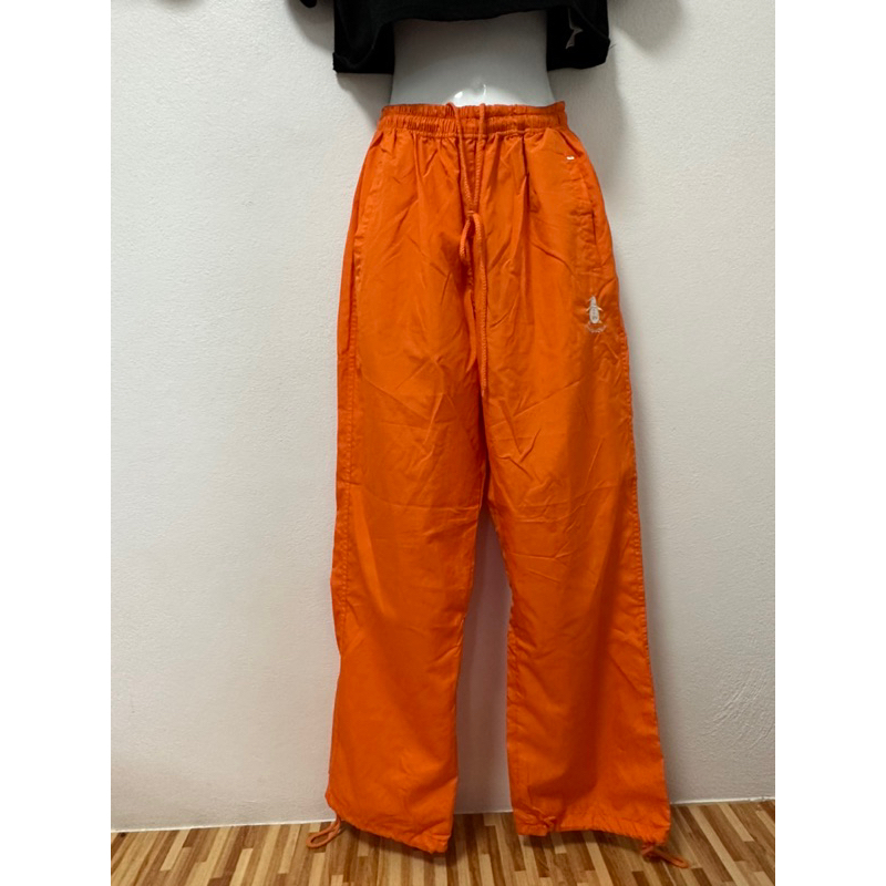 กางเกงวอร์มผ้าร่มสีส้ม | Shopee Thailand
