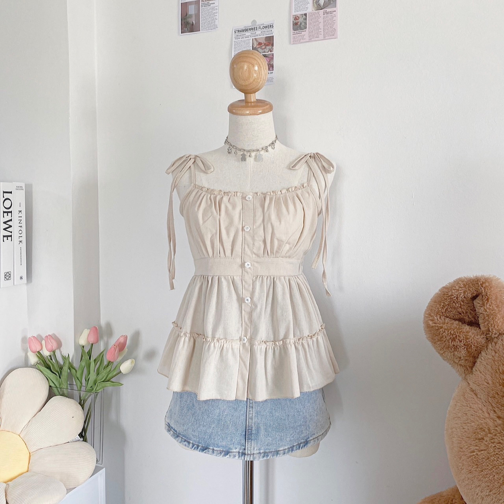 Miyong ทิวลิป เสื้อสายเดี่ยวผูกไหล่ ผูกโบว์ด้านหลัง แต่งระบายและกระดุม ...