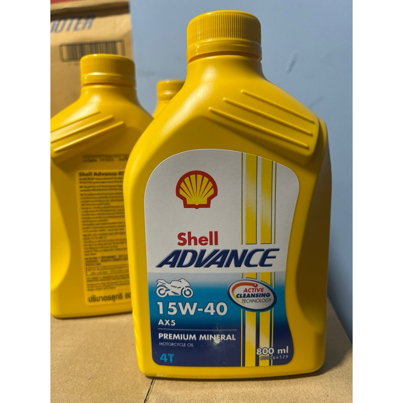 น้ำมันเครื่อง รถจักรยานยนต์ เชล เหลือง รถเกียร์ shell ax5 4T sae 15w-40 หรือ 10w-30 ขนาด 0.8 ...