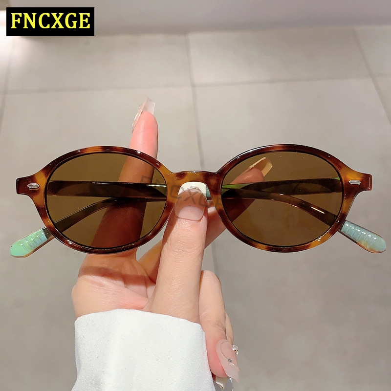 FNCXGE แว่นตากันแดด ผู้หญิง ผู้ชาย เกาหลี แฟชั่น ป้องกันรังสียูวี แว่นทรงวงรี แว่นตา Unisex ฤดู ...