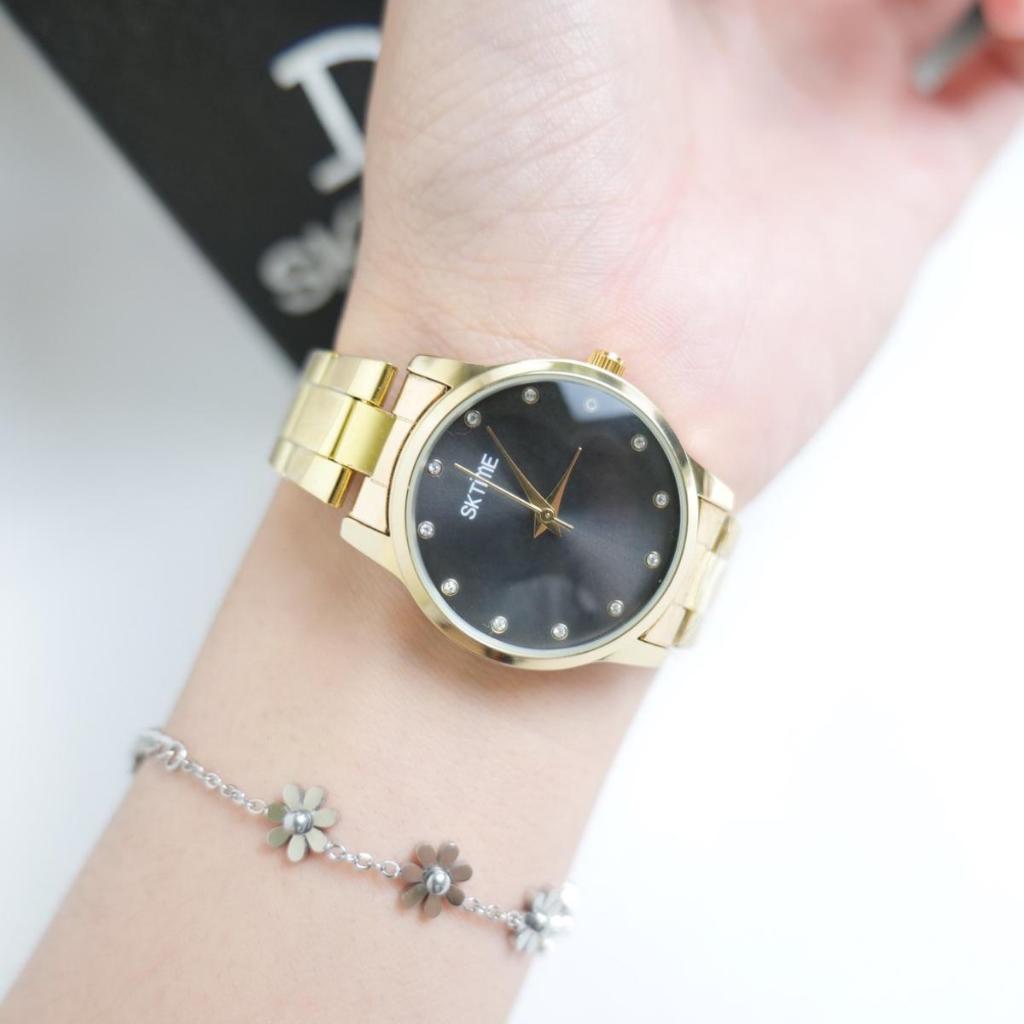 SKTIME นาฬิกาผู้หญิง สแตนเลสทอง ปัดกลมเรียบ แต่งเม็ดเพชร 12 เม็ด ...
