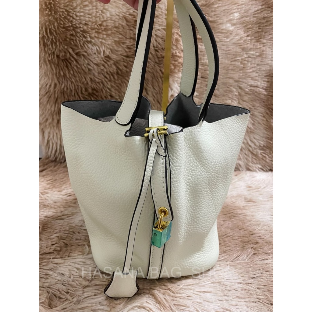 กระเป๋าหนังวัวแท้ ทรงพิโคติน แบรนด์ LASTEL By Oilry-store สีขาวแคร์ ...